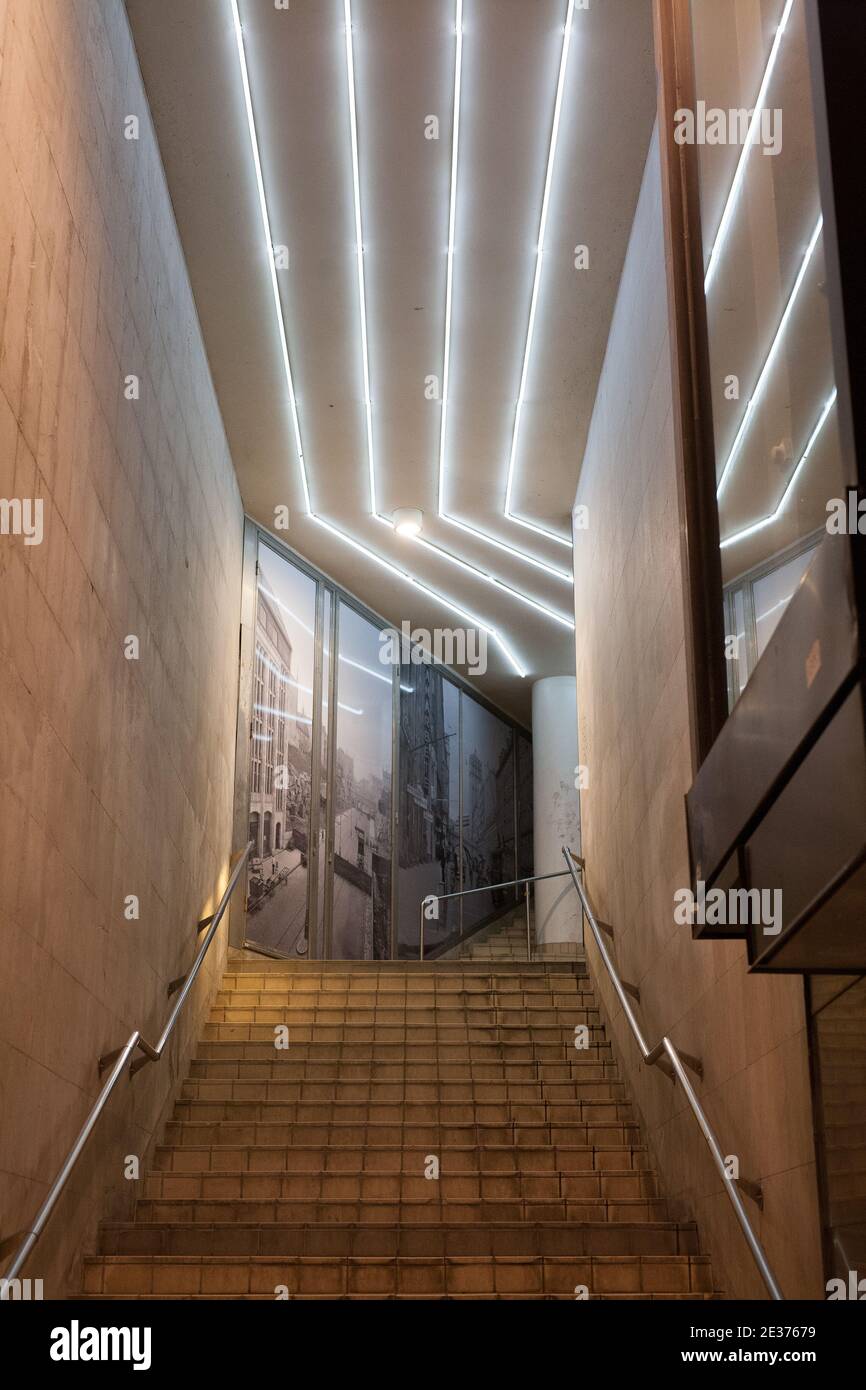 A low angle view of the staircase in hallway with lights covering the ...