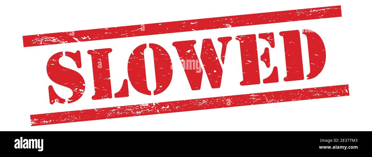 SLOWED text on red grungy vintage rubber stamp Stock Photo - Alamy