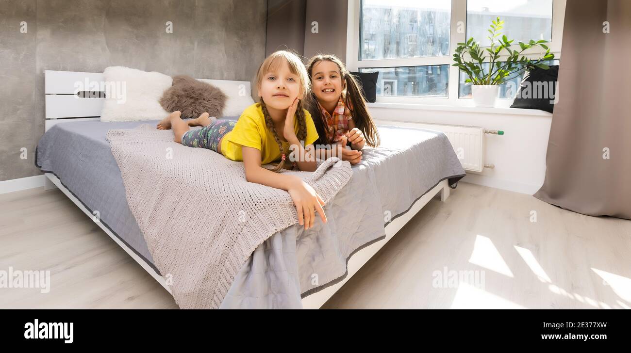 Creative cute girls, two sisters at home Stock Photo - Alamy