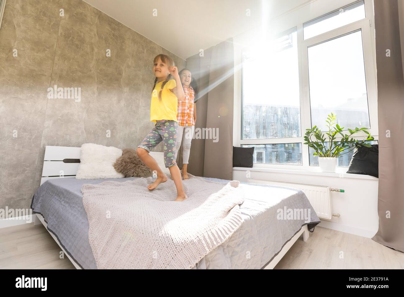 Creative cute girls, two sisters at home Stock Photo - Alamy