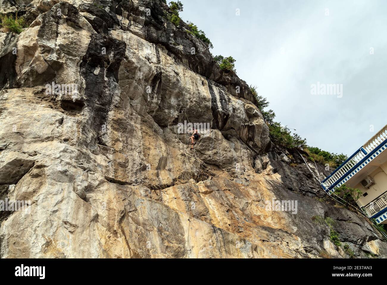 Top rope climbing rocks or top roping, anchor system at the top of the ...