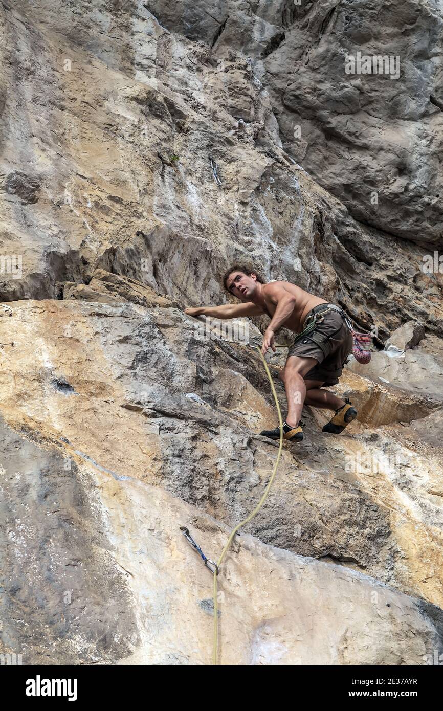 Top rope climbing rocks or top roping, anchor system at the top of the ...