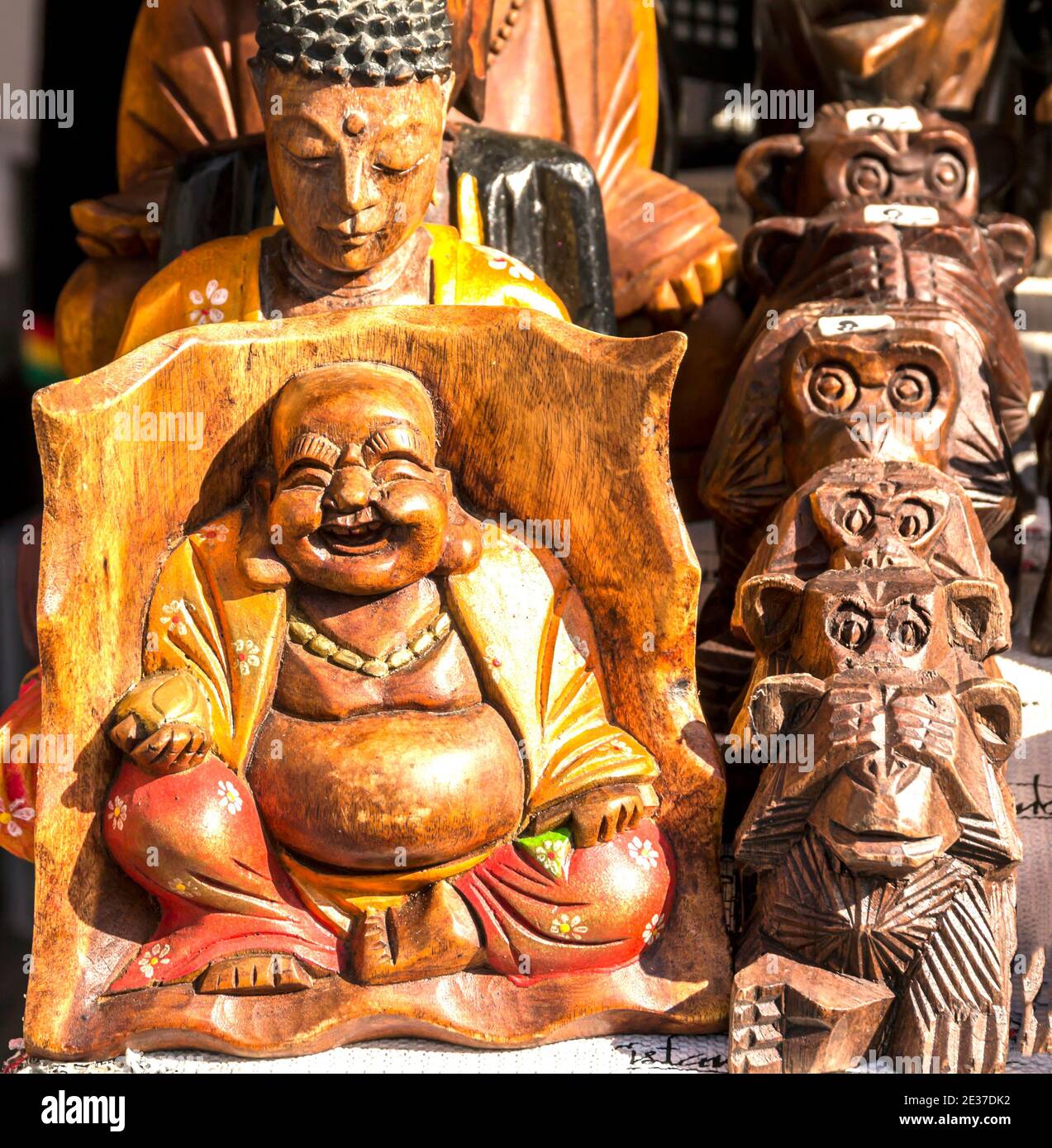Hotei or the laughing Buddha is a wooden statue Stock Photo - Alamy