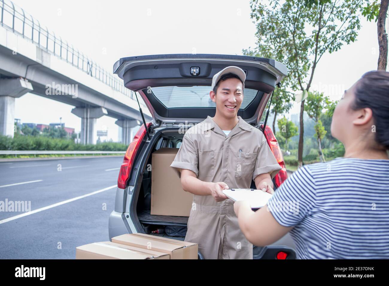 Chinese uniform driver hi-res stock photography and images - Alamy