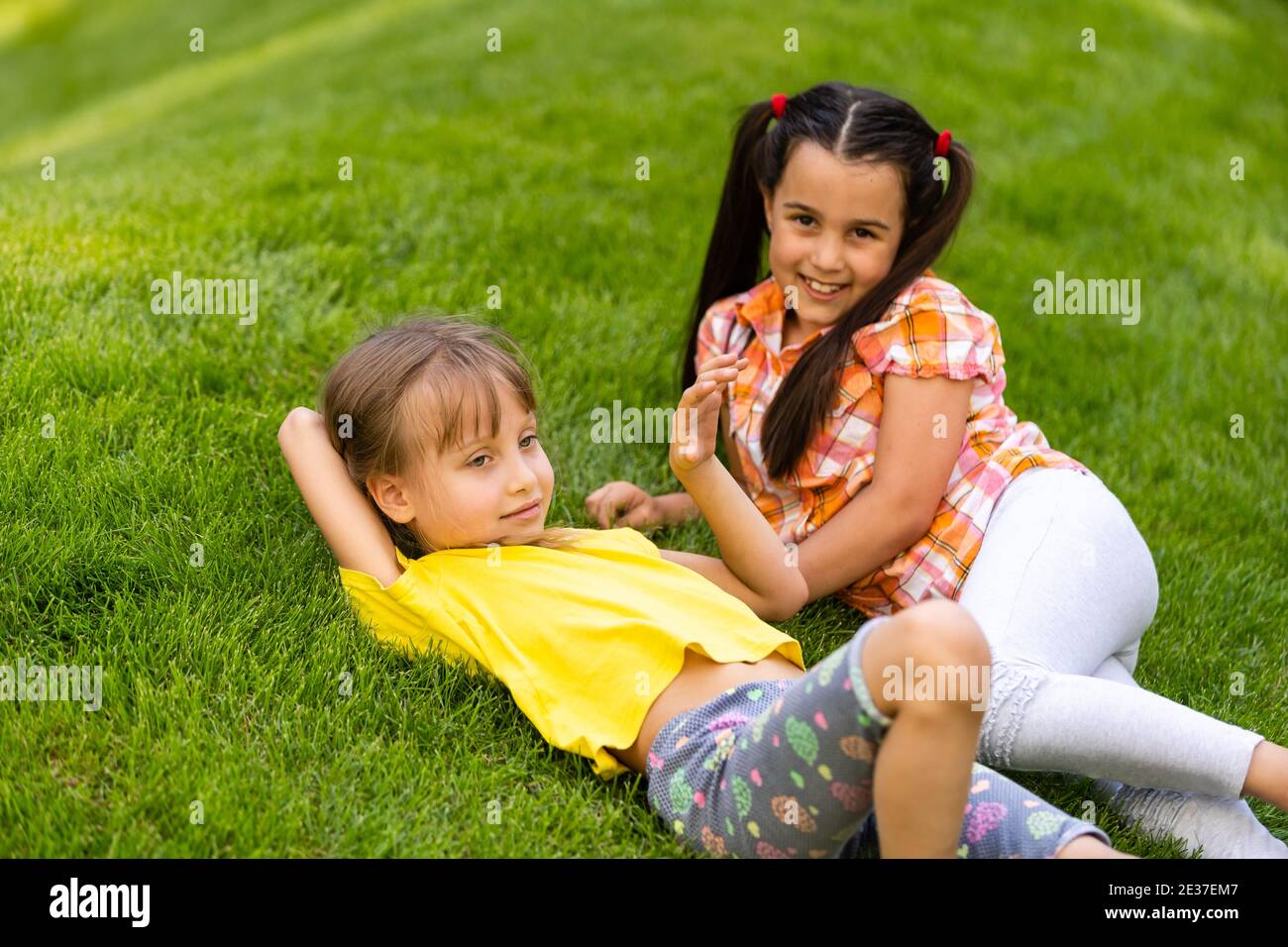 happy excited kids having fun together on playground Stock Photo - Alamy