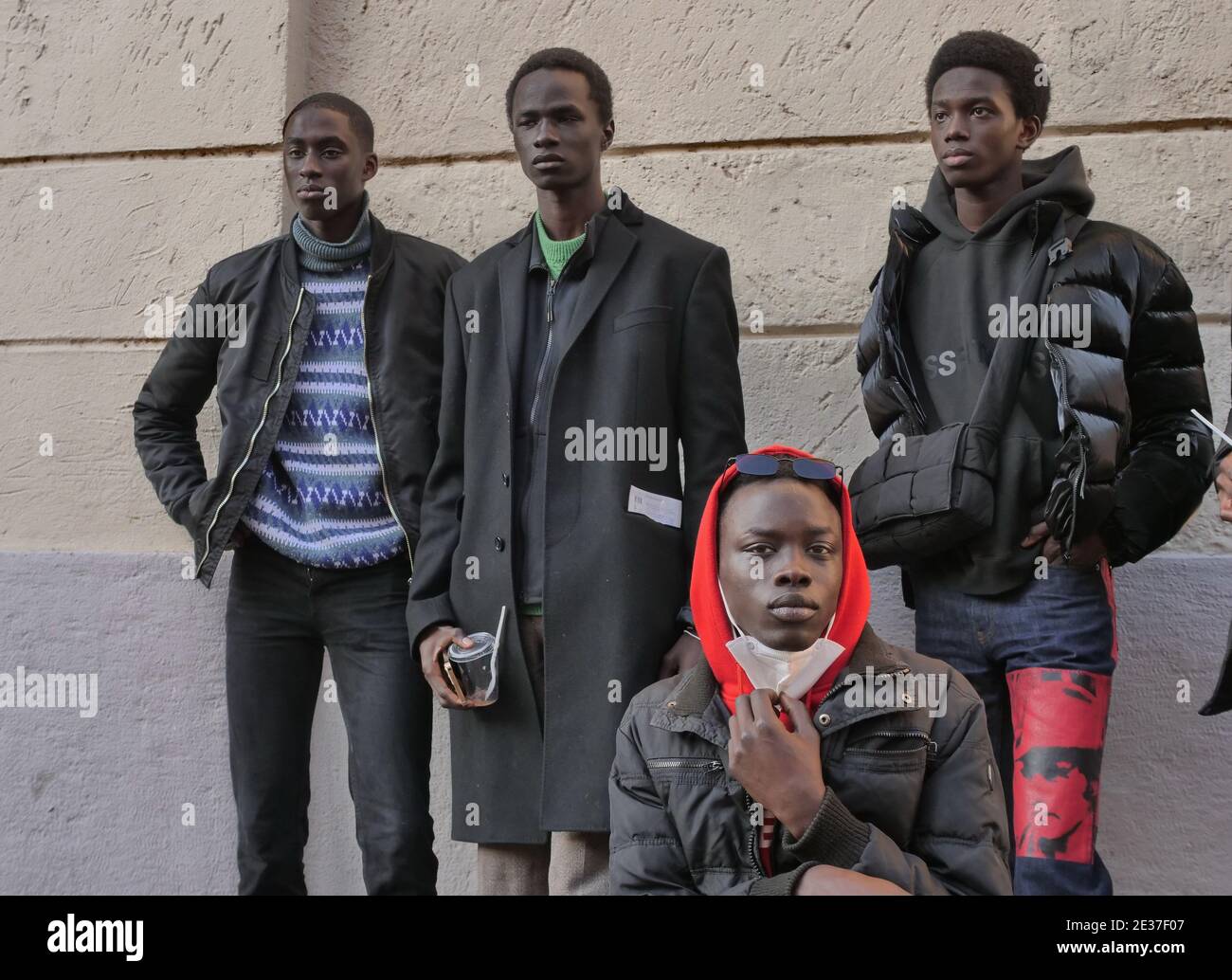 Etro models posing for photographers in the street after Etro fashion ...