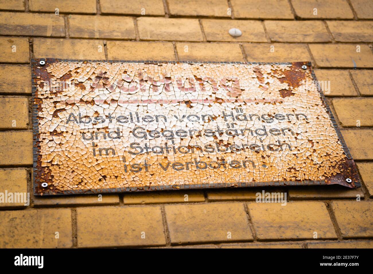 brick wall with old german sign Stock Photo - Alamy