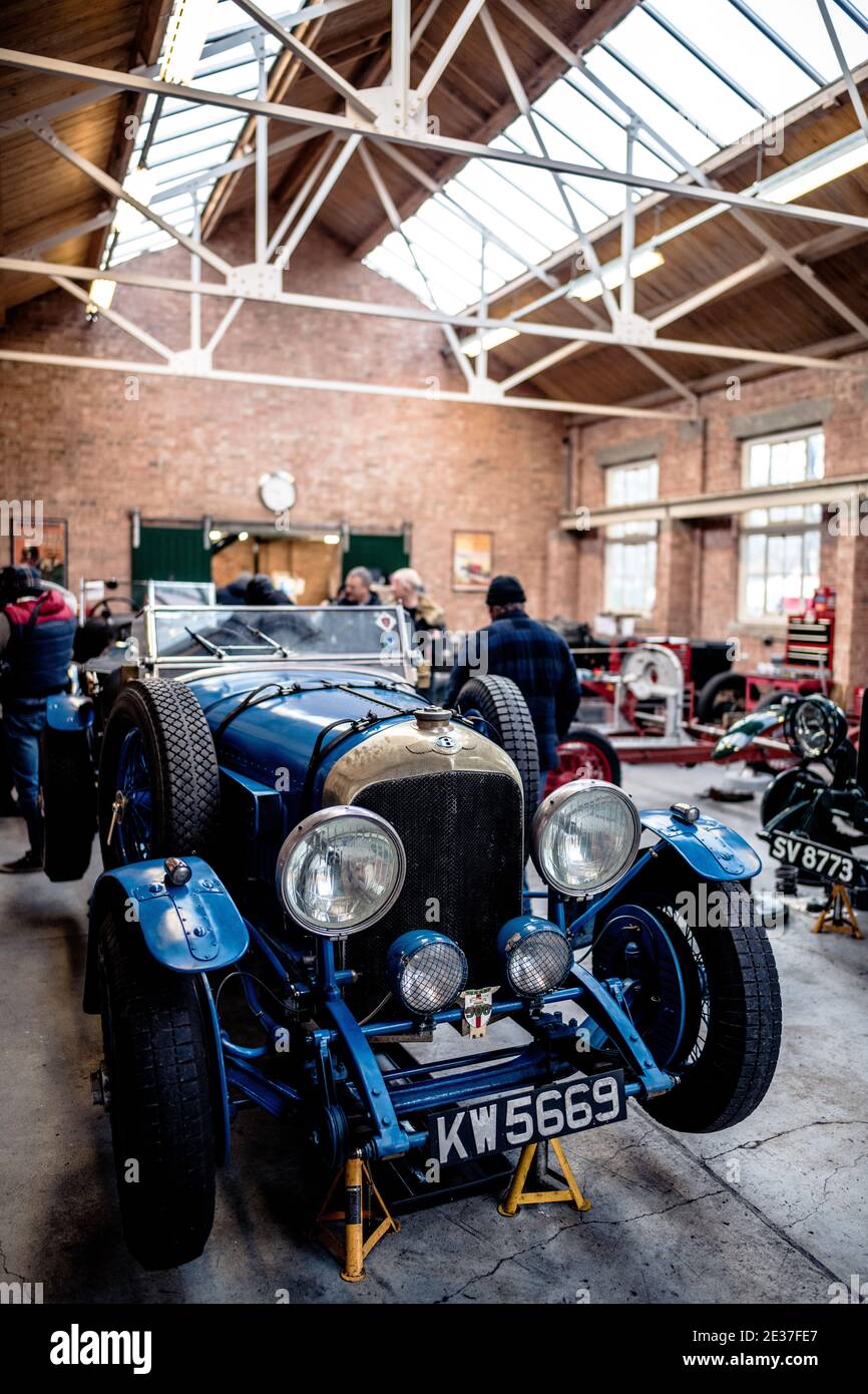 Classic car workshop scenes during an open day at Bicester Heritage ...