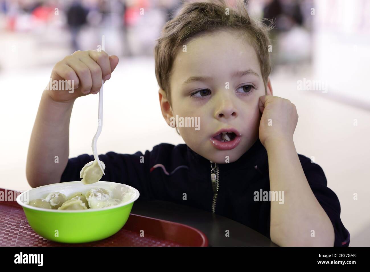 Boy thinking dinner hi-res stock photography and images - Alamy