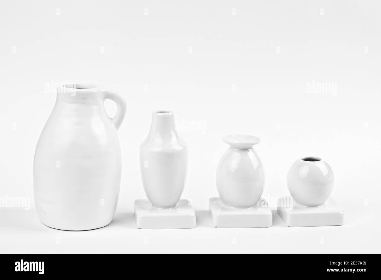 Decorative porcelain empty white vases on white background Stock Photo ...
