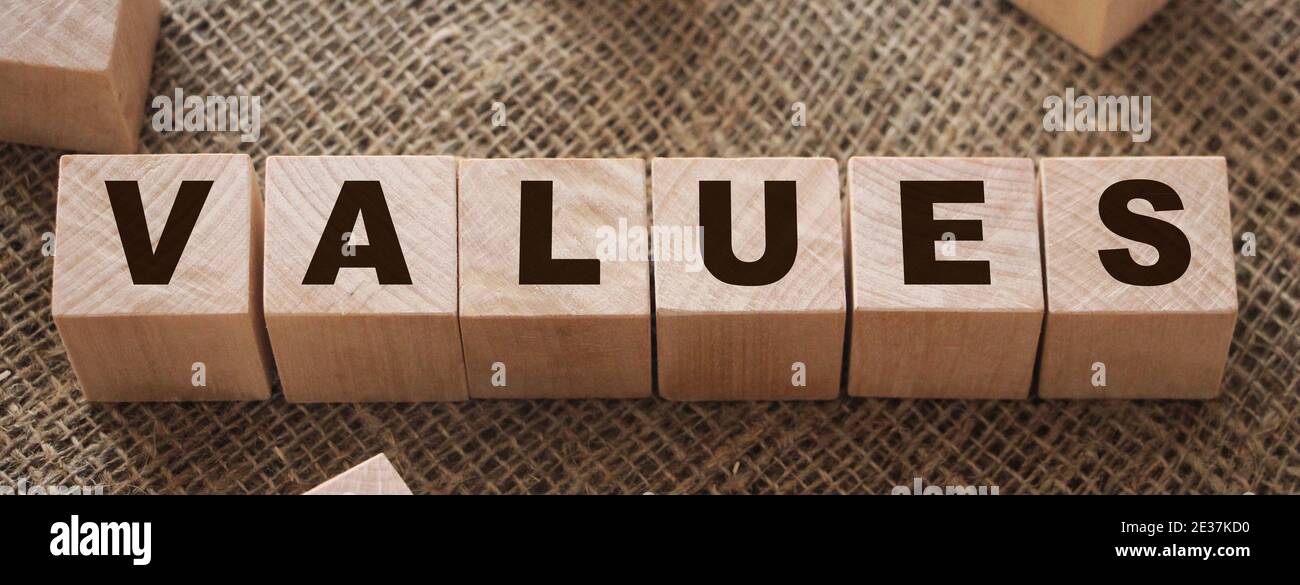 Values Word Written In Wooden Cubes on burlap background. Core values ...