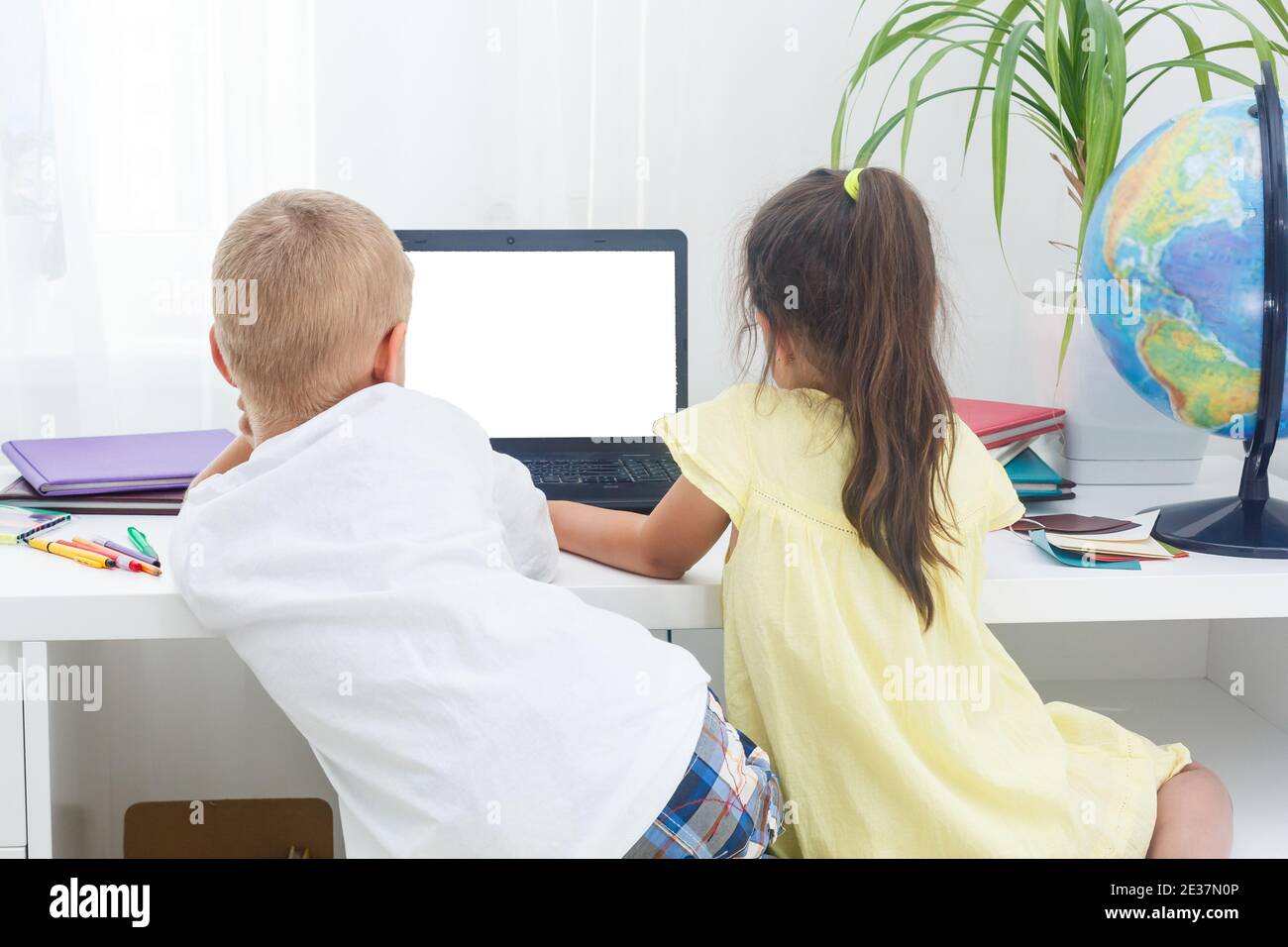 small preschool child with laptop screen blank Stock Photo - Alamy