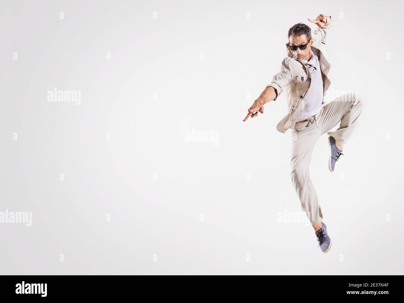 Portrait of a handsome, talented dancer making a dance move Stock Photo ...
