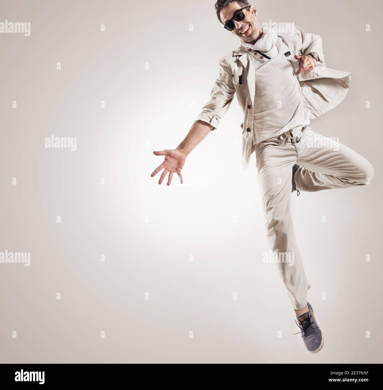 Portrait of a handsome, talented dancer making a dance move Stock Photo ...