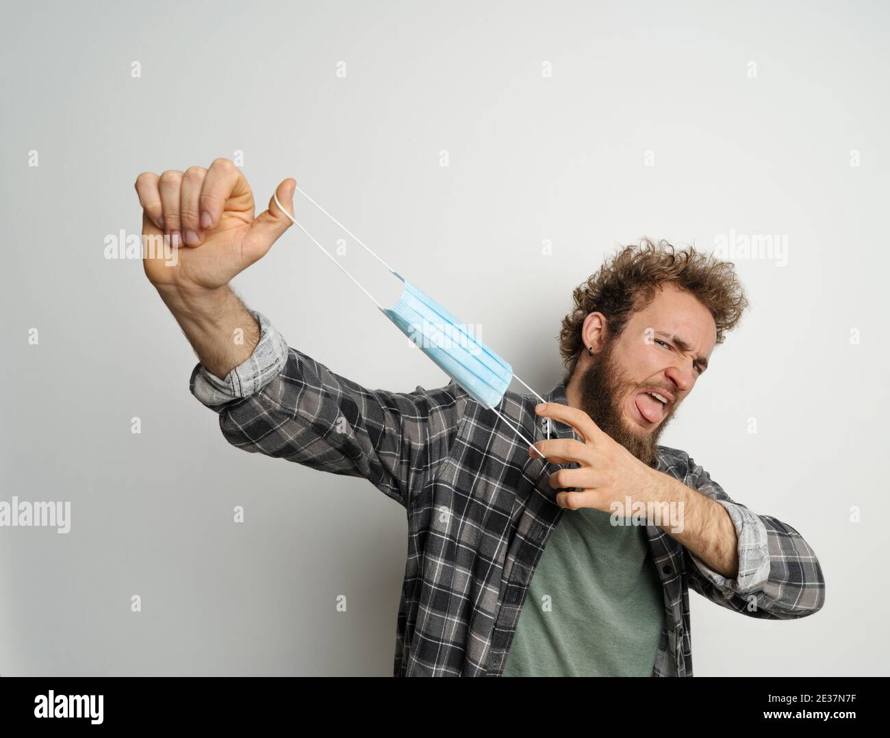 Man holding mask face hi-res stock photography and images - Alamy