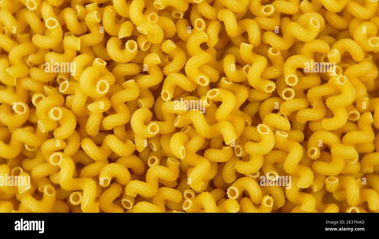 A lot of dry pasta as spirals shape. Popular Italian and European ...