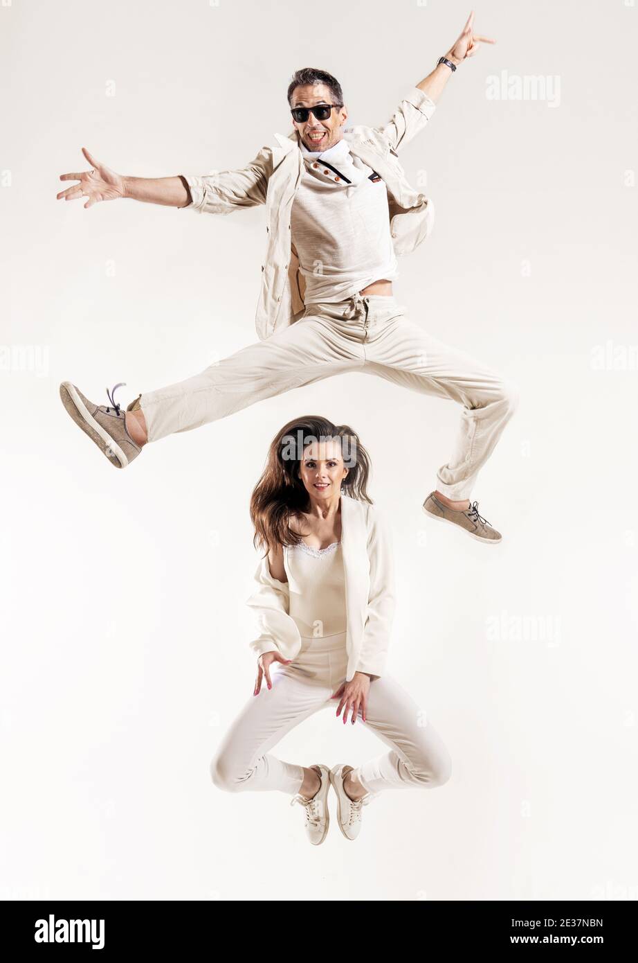 Talented couple dancing in a bright studio - isolated Stock Photo - Alamy