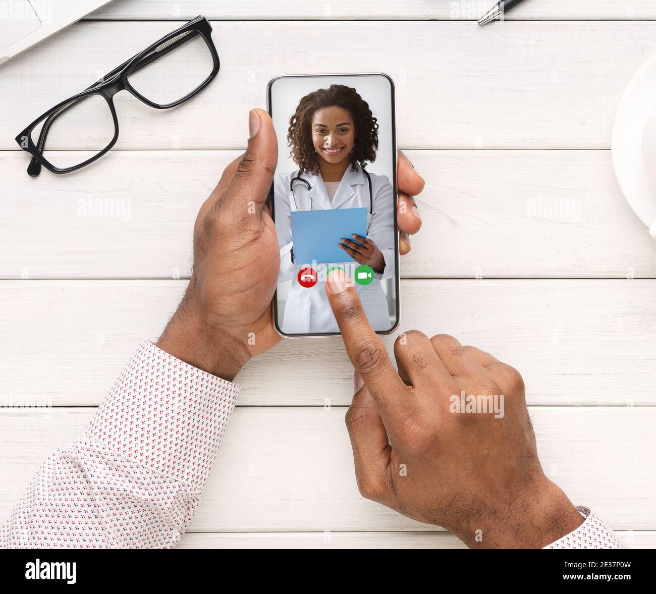 Man making video call doctor hi-res stock photography and images - Alamy