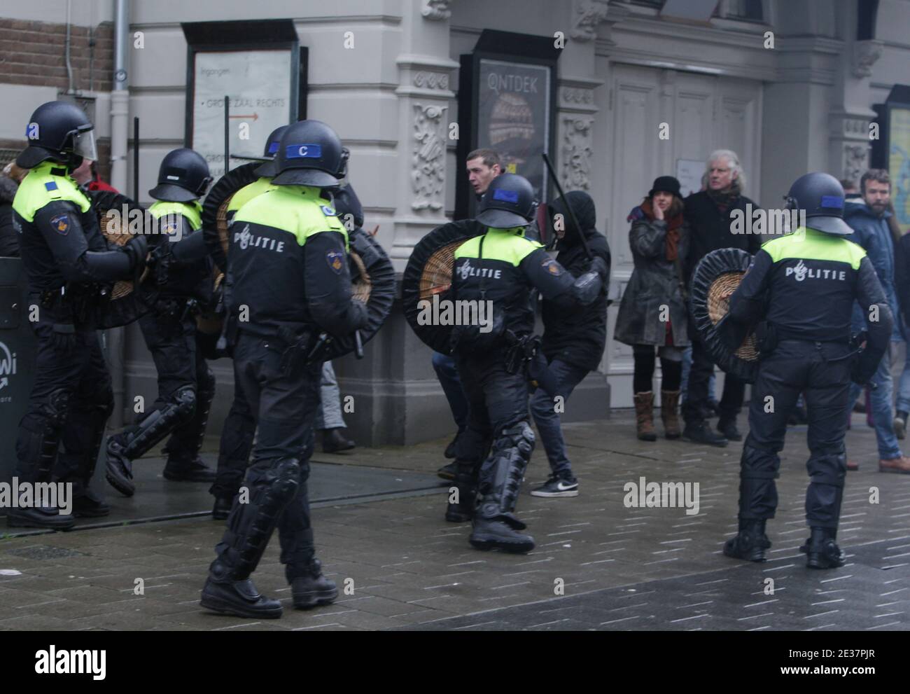 Amsterdam, Netherlands. 17th Jan, 2021. Anti-lockdown protestors reacts ...