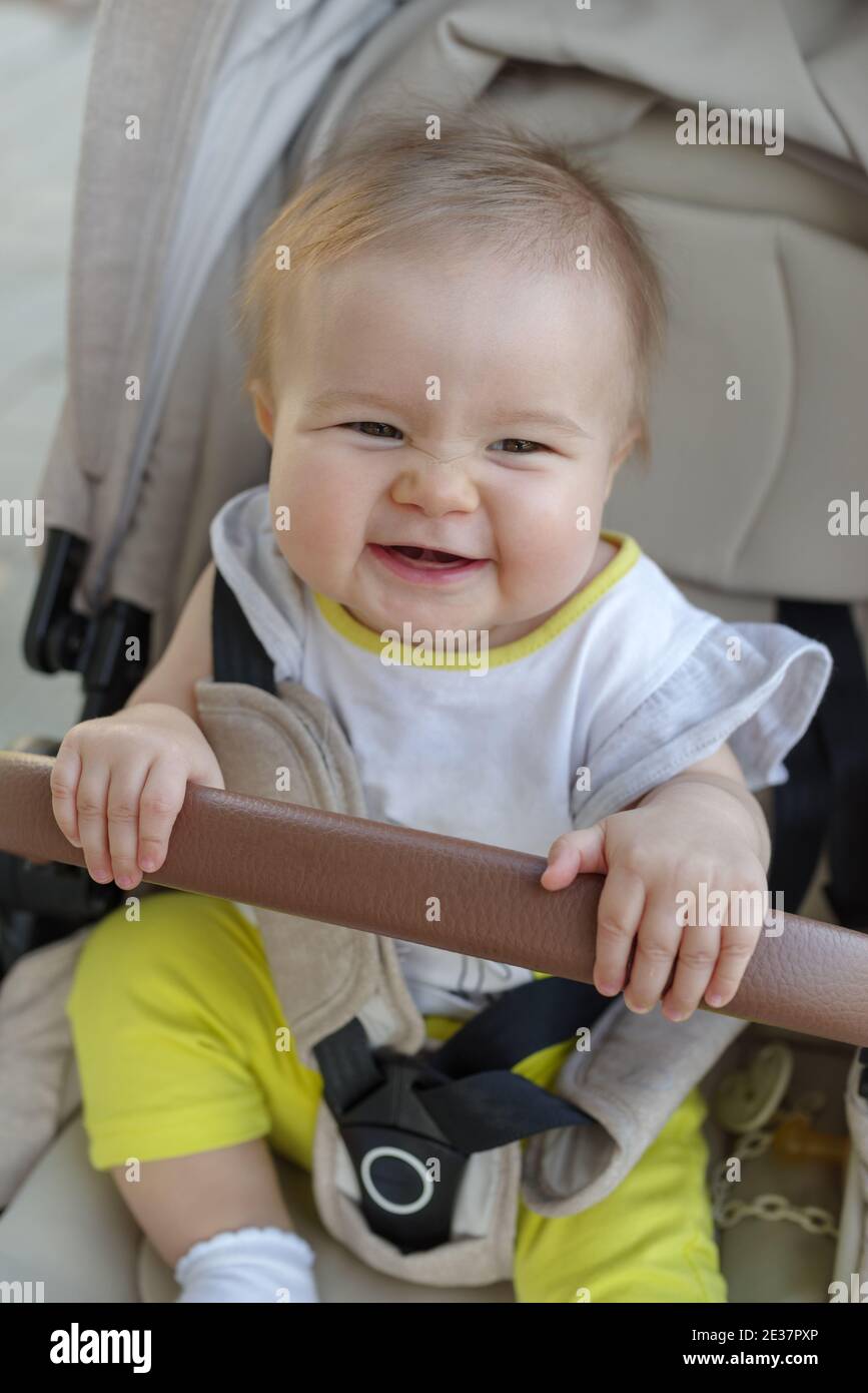 Girl in baby stroller hi-res stock photography and images - Alamy