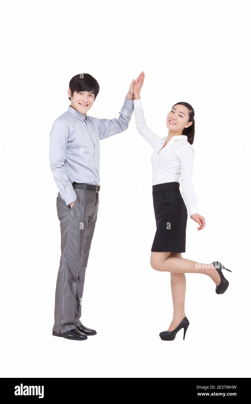 Portrait of business man and business woman claping high quality photo ...