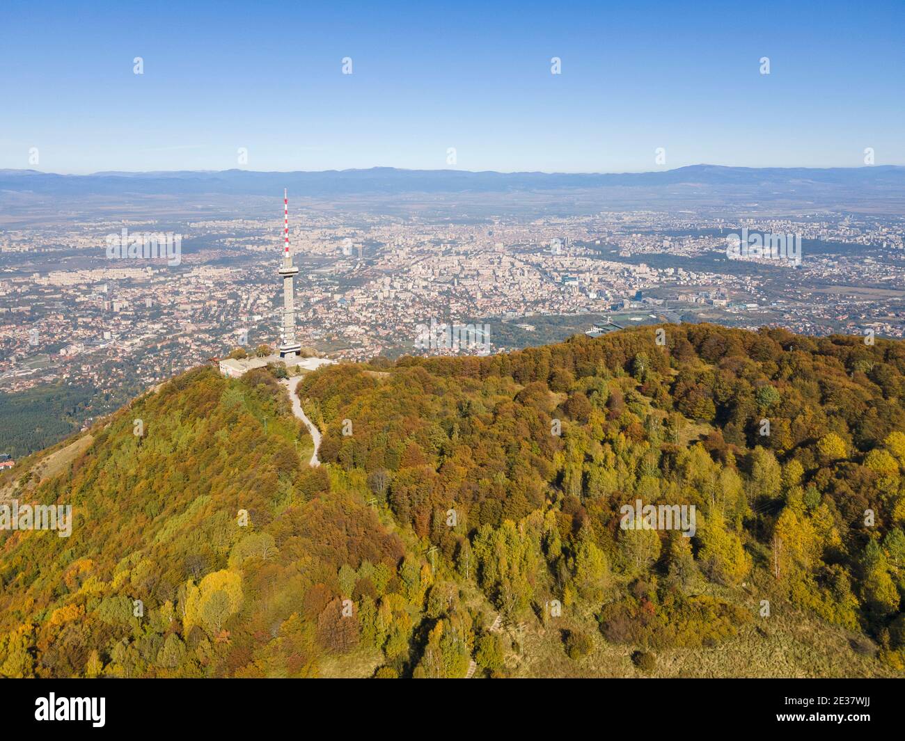 Aerial Autumn panorama of Kopititoto tower at Vitosha Mountain and city ...