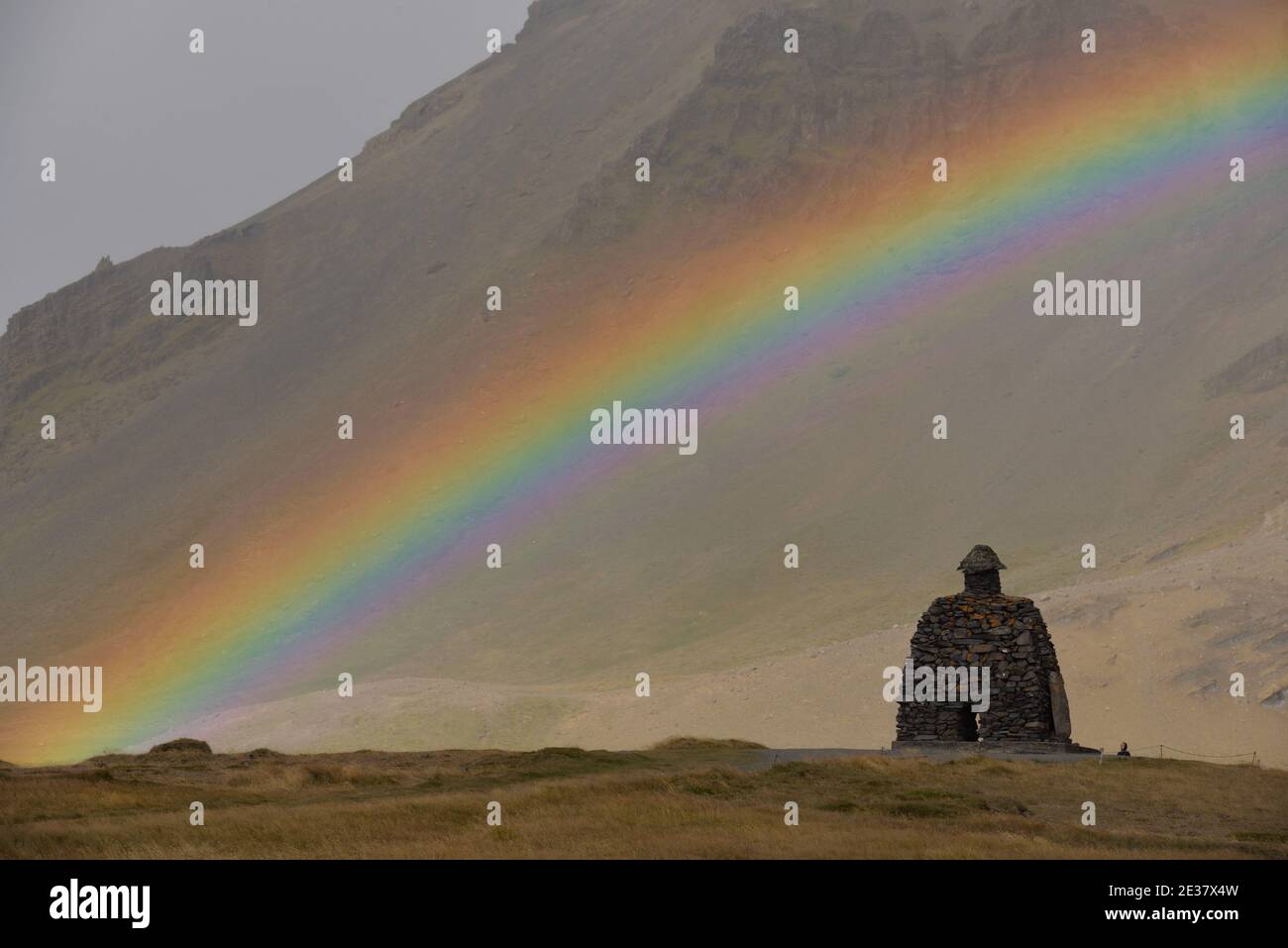 Rainbow over Bárðar Saga Snæfellsáss StatueSnæfellsjökull National Park ...