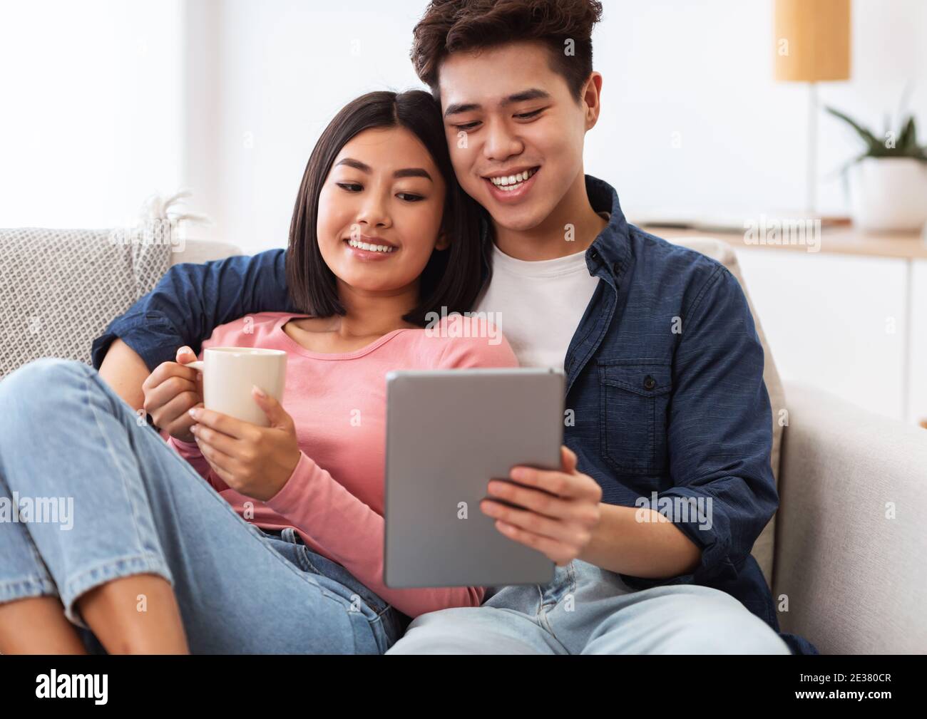 Young japanese couple watching movie hi-res stock photography and ...