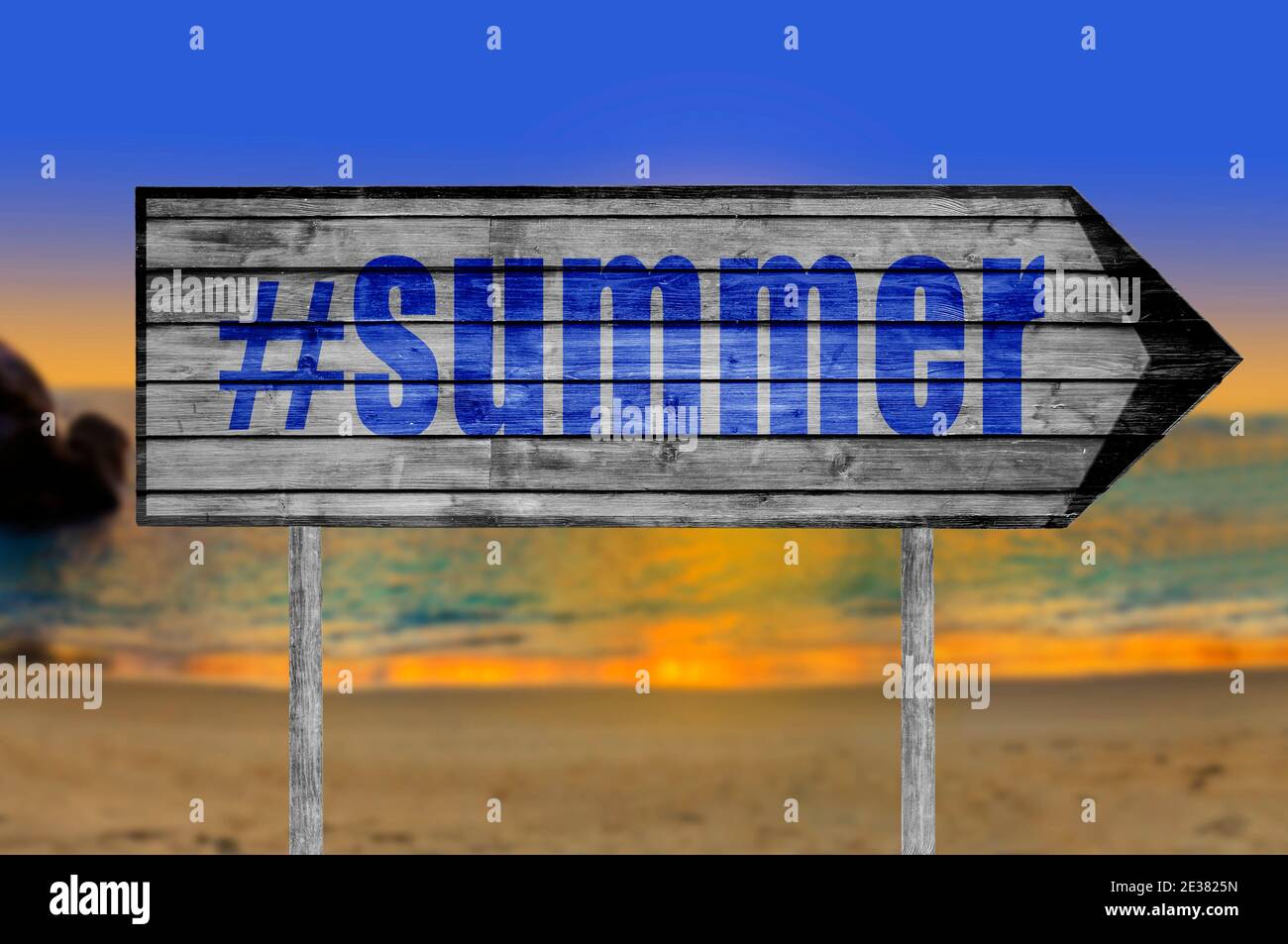 The word with hashtag SUMMER wooden sign with on a beach background ...