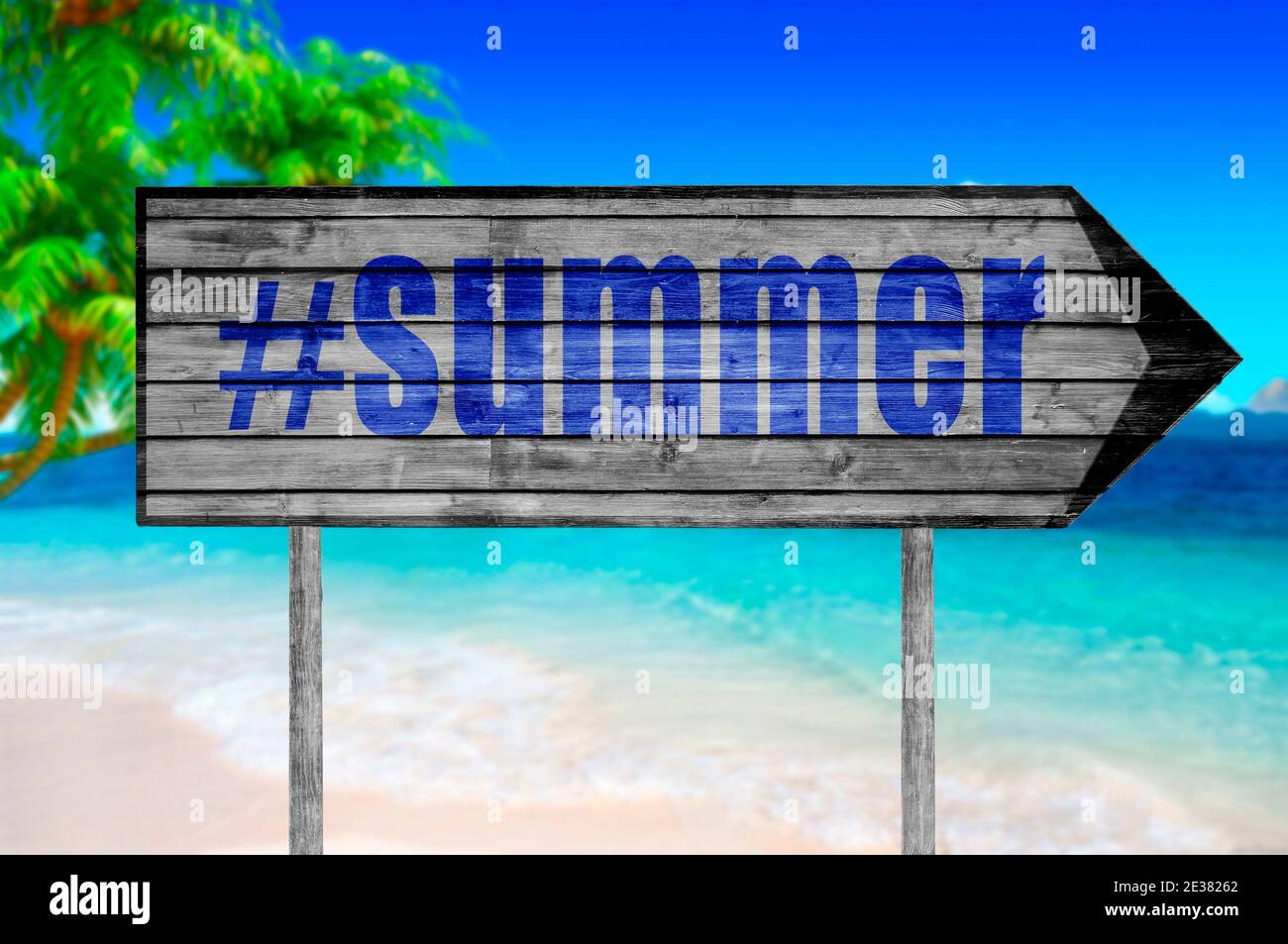 The word with hashtag SUMMER wooden sign with on a beach background ...