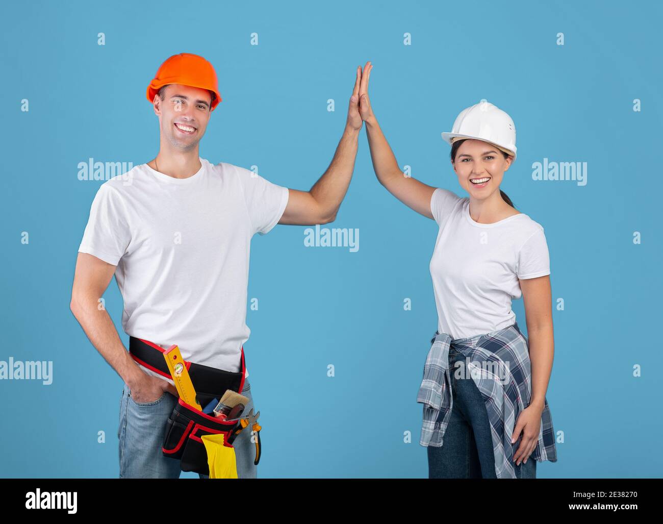 Female workers celebrating high five hi-res stock photography and ...