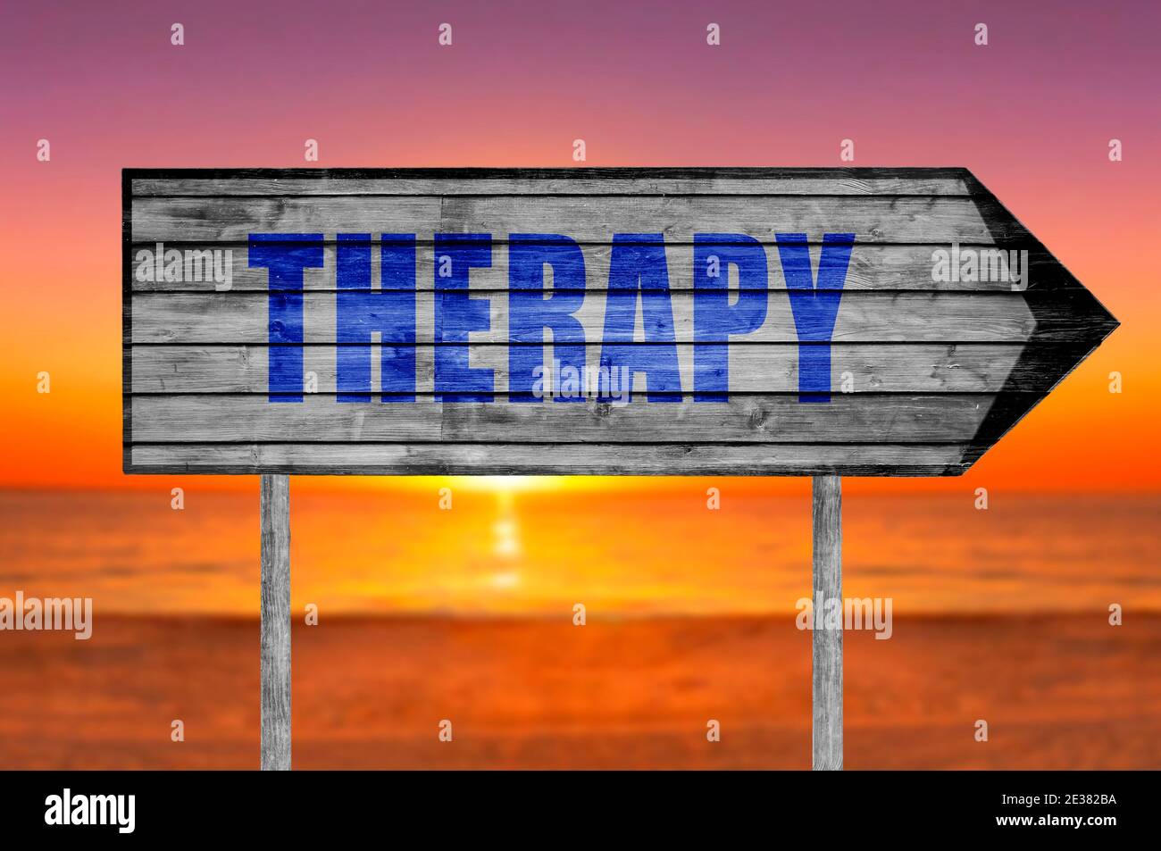 Therapy wooden sign with a beach on background Stock Photo - Alamy
