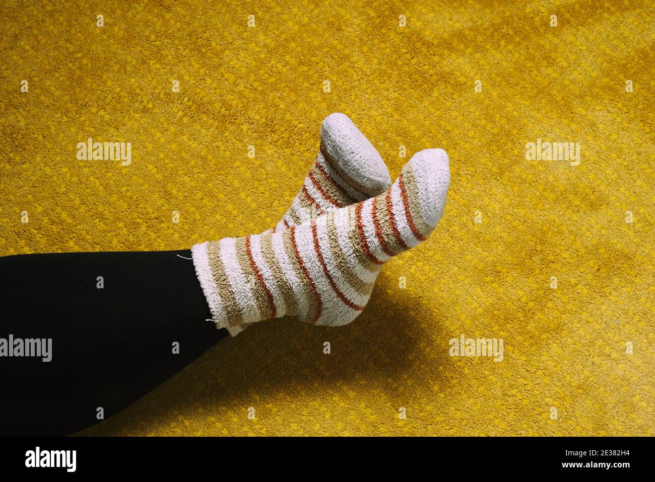 Feet crossed and socks hi-res stock photography and images - Alamy