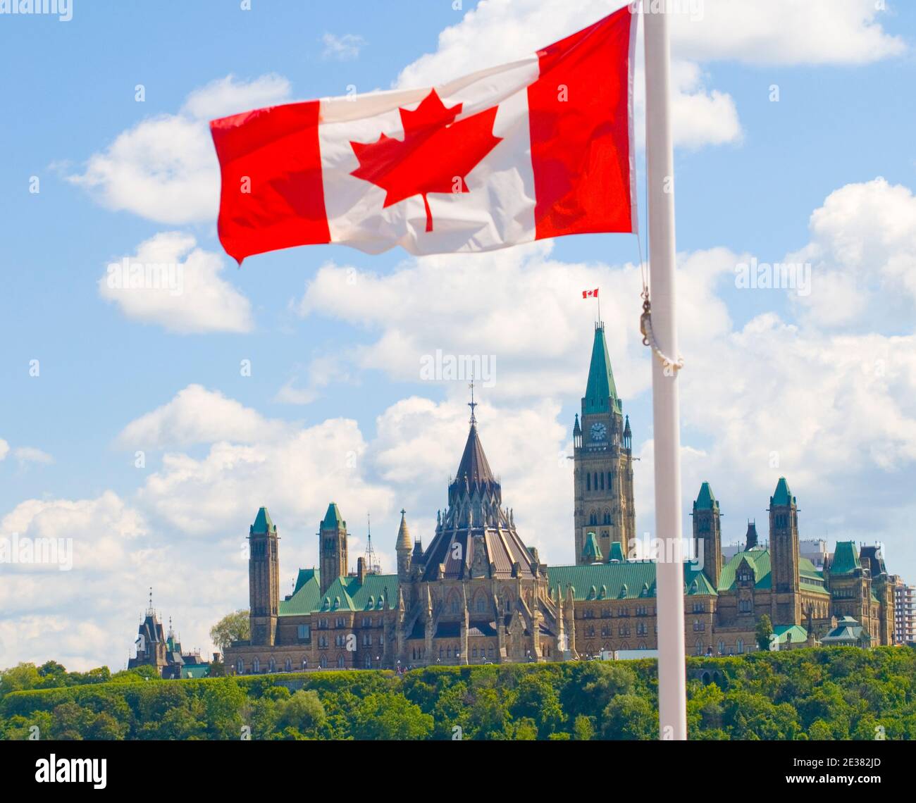 Canadian Flag with Parliament Building in the Background, Ottawa, Ontario, Canada Stock Photo ...
