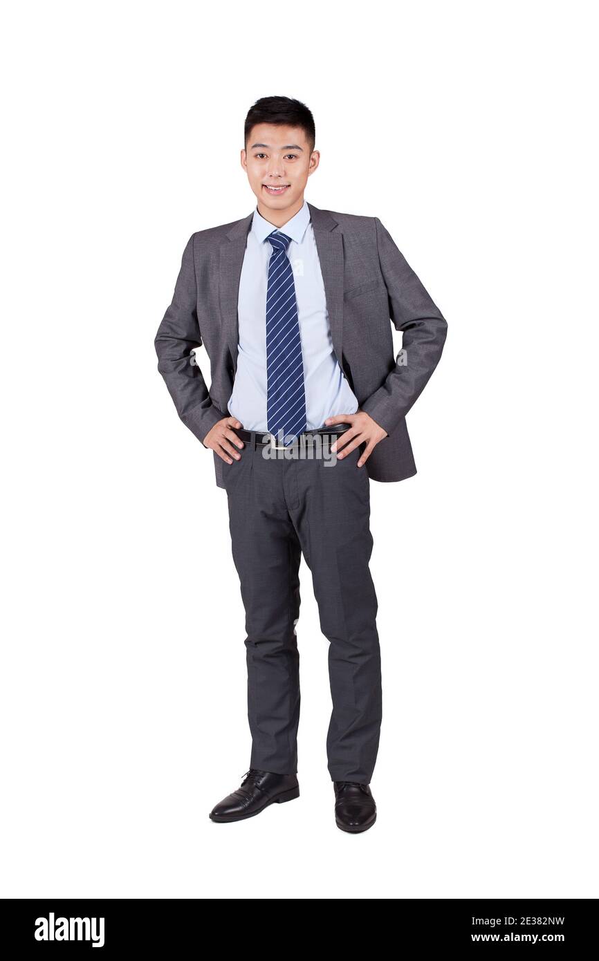 A Successful business man with arms akimbo high quality photo Stock ...