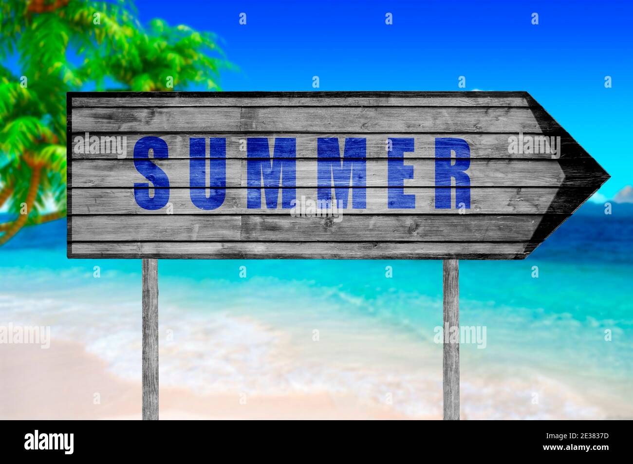 Summer wooden sign with on a beach background Stock Photo - Alamy
