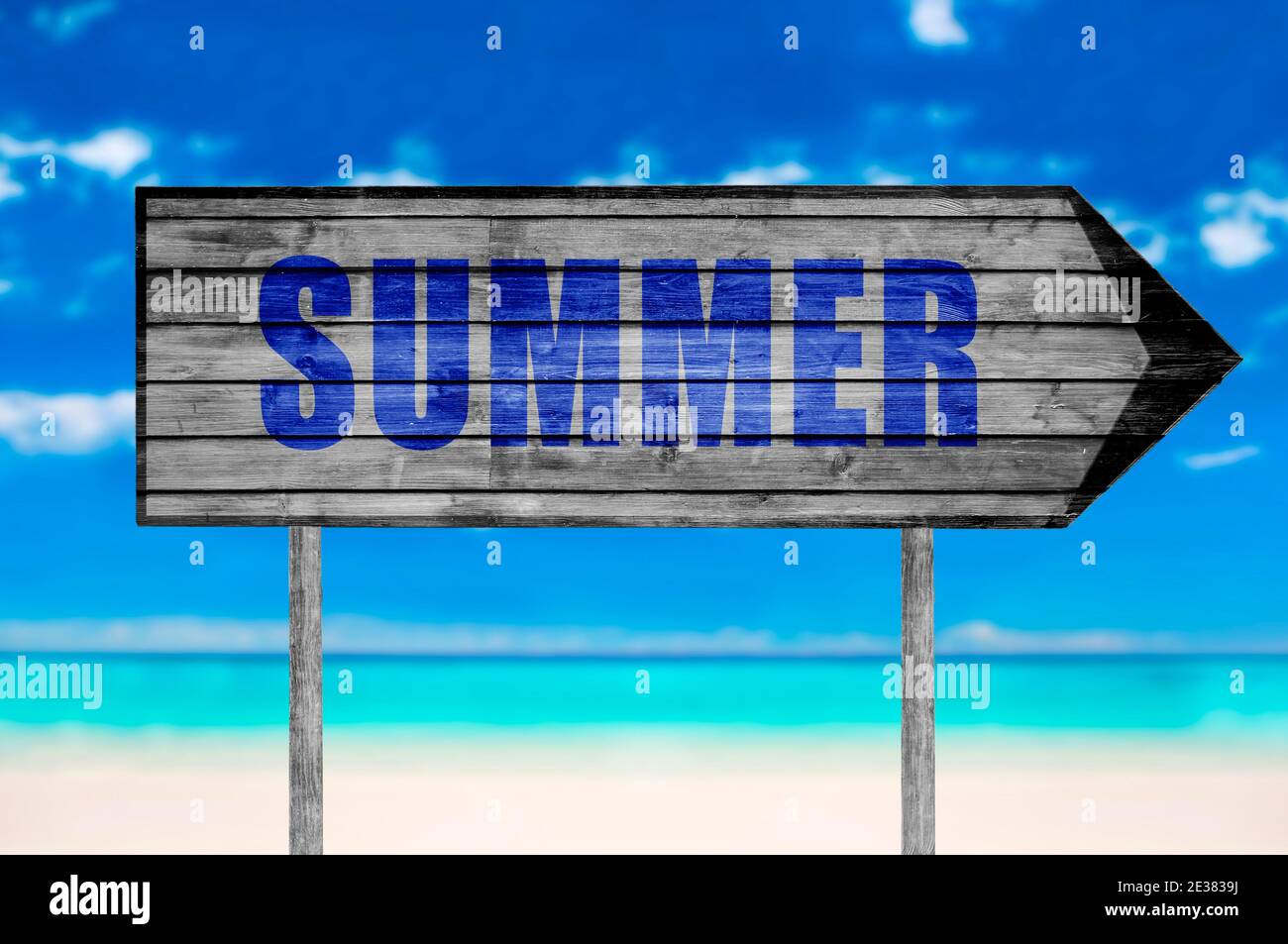 Summer wooden sign with on a beach background Stock Photo - Alamy