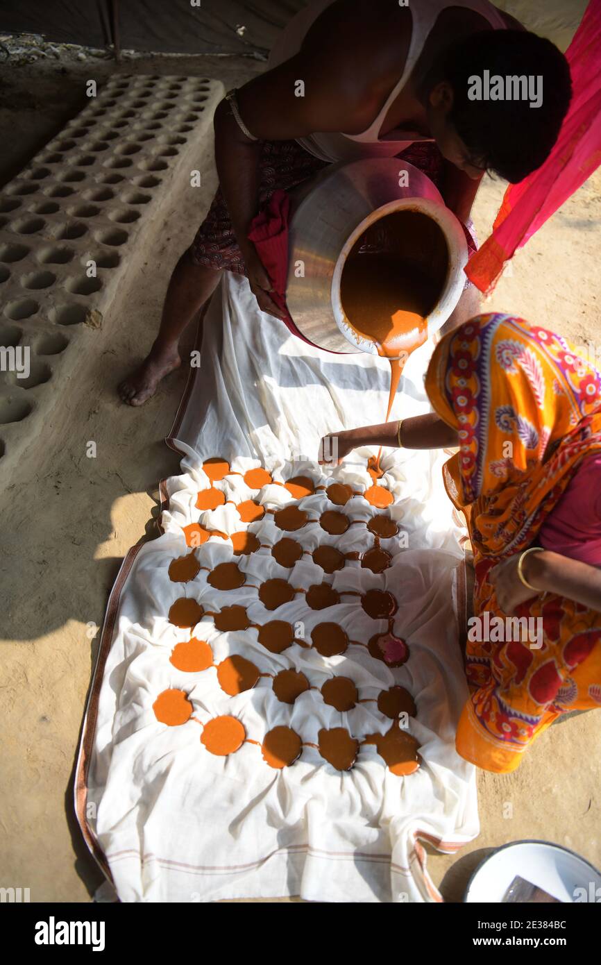 Family members of palm sap collectors are making jaggery from palm sap ...