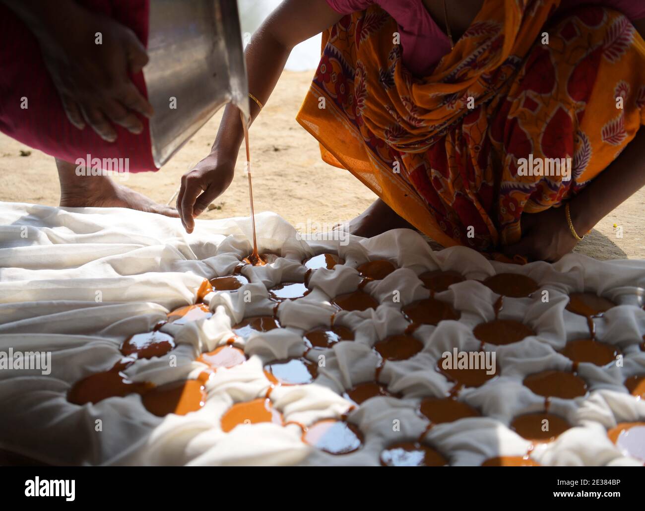 Family members of palm sap collectors are making jaggery from palm sap ...