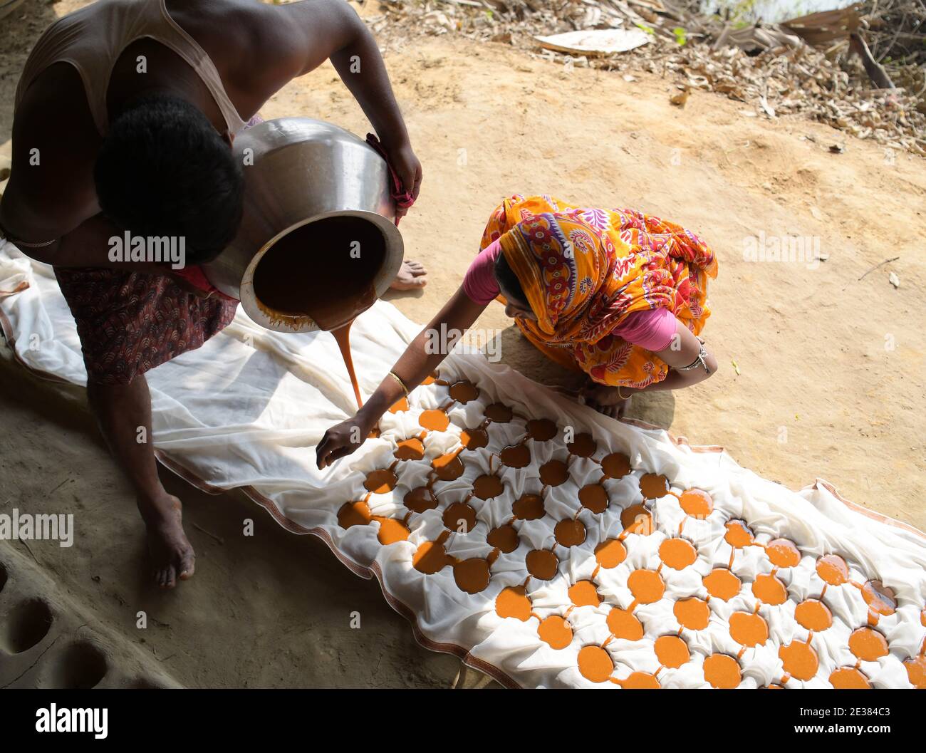Family members of palm sap collectors are making jaggery from palm sap ...