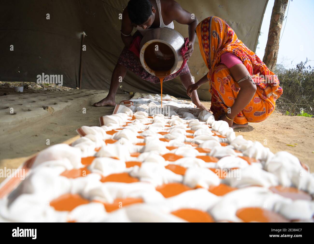 Family members of palm sap collectors are making jaggery from palm sap ...