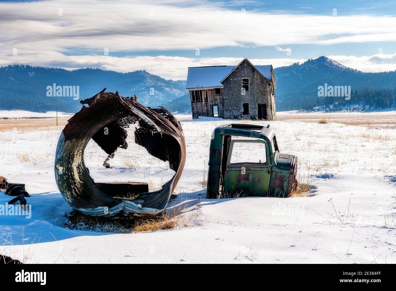 Mountains Idaho homestead with rusted junk Stock Photo - Alamy