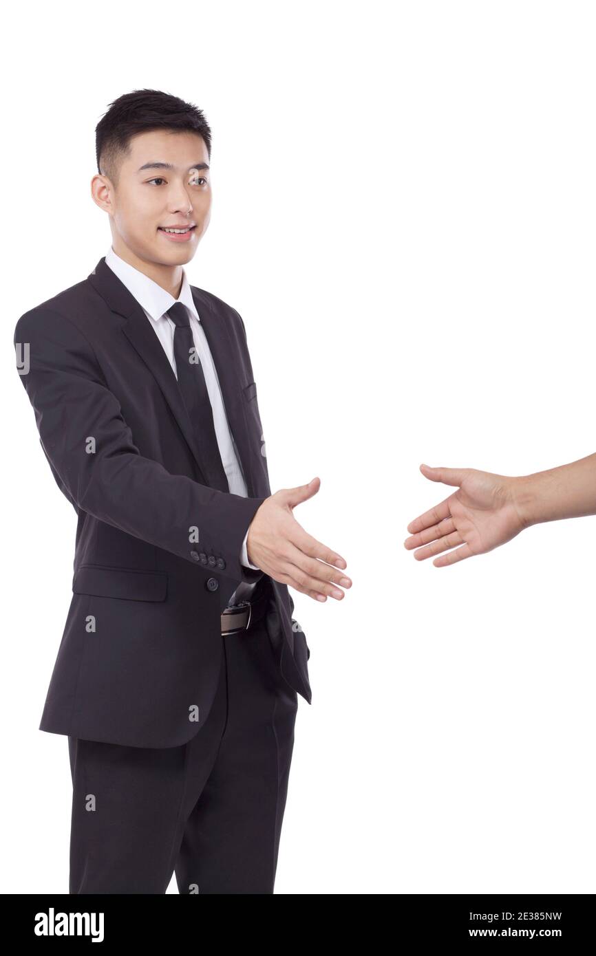 Shaking two hands reaching out Cut Out Stock Images & Pictures - Alamy