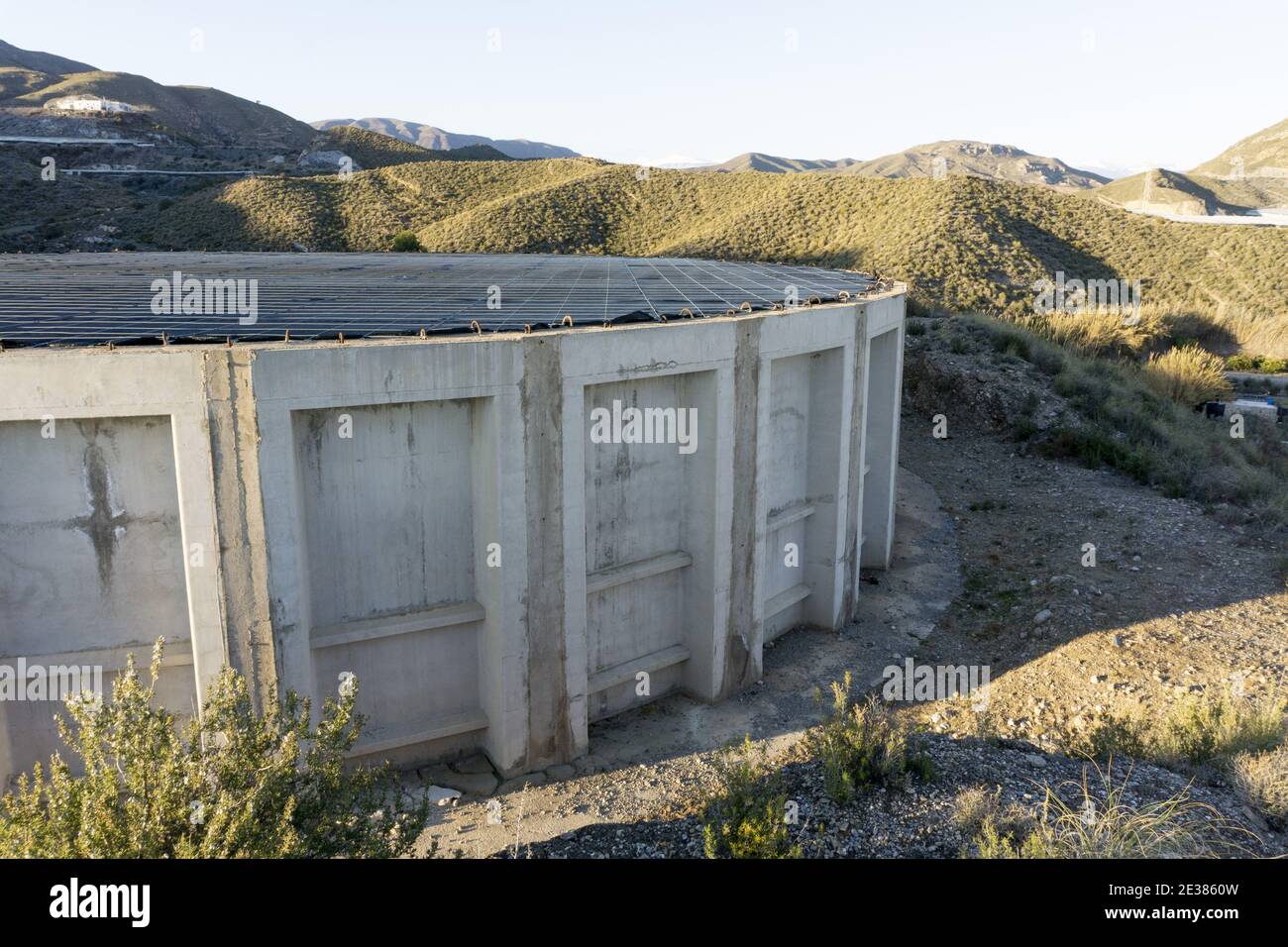 concrete water basin to supply greenhouses Stock Photo - Alamy