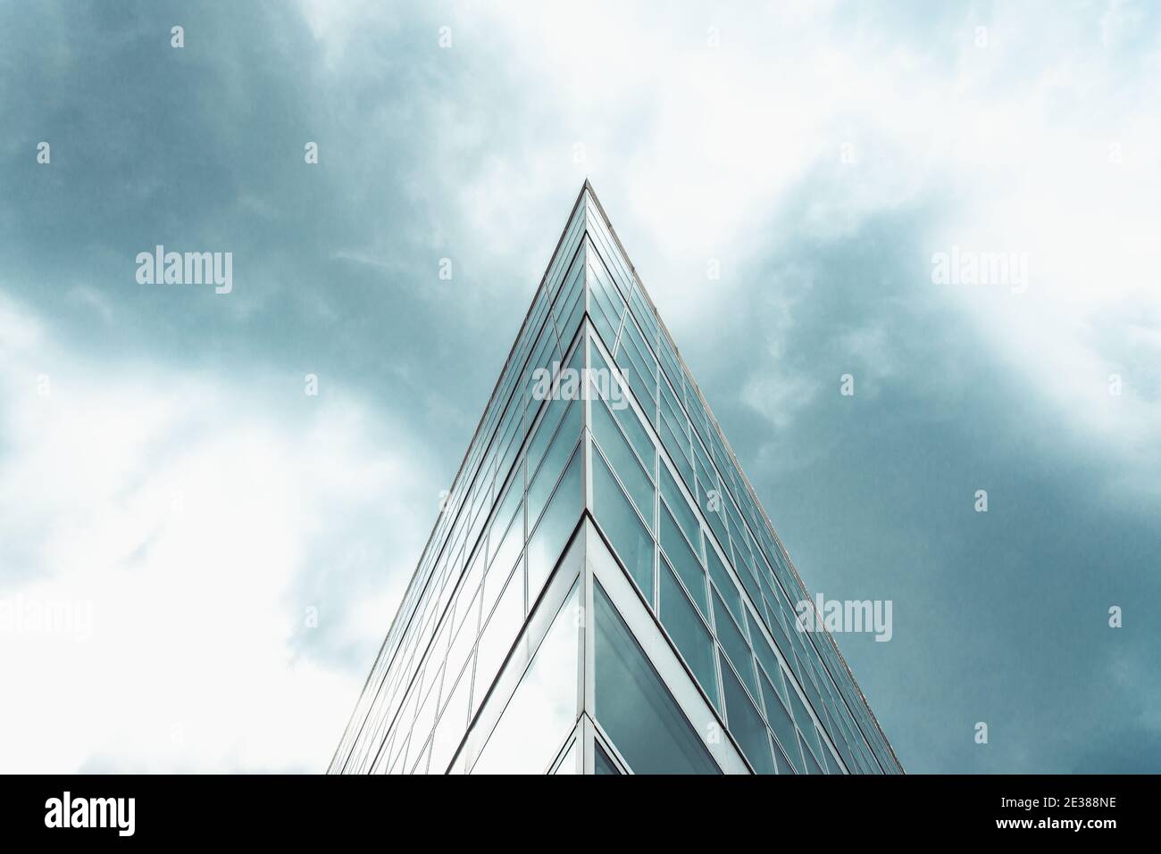triangle shaped structure against a blue cloudy sky Stock Photo - Alamy