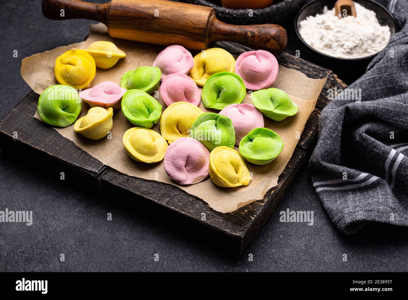 Multi colored dumplings stuffed with meat Stock Photo - Alamy
