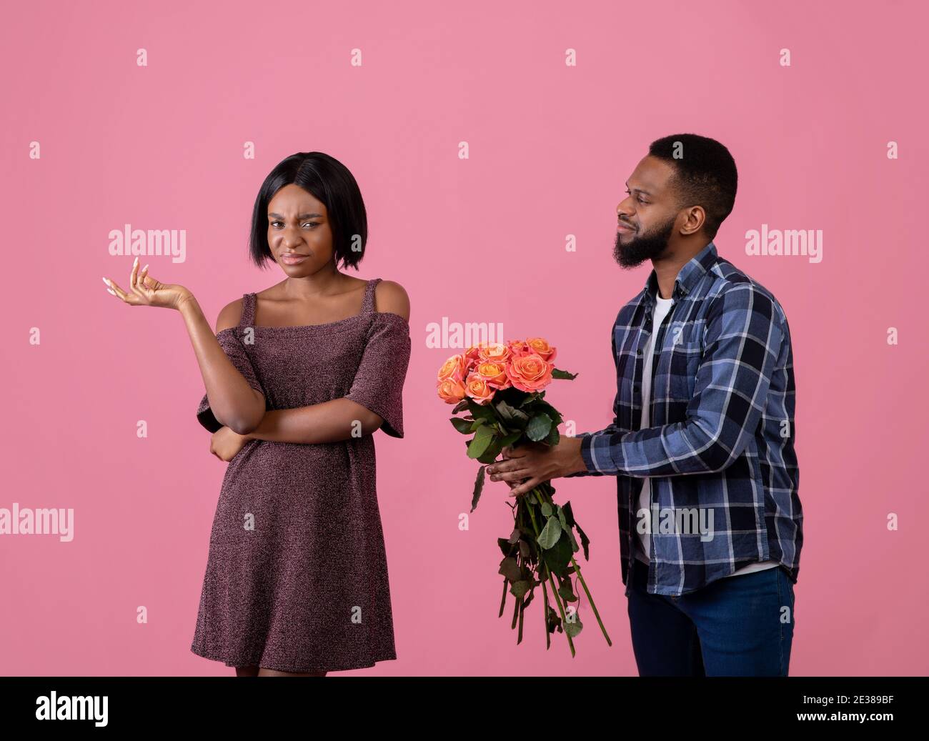 Unwanted confession. Displeased black woman rejecting her admirer with ...