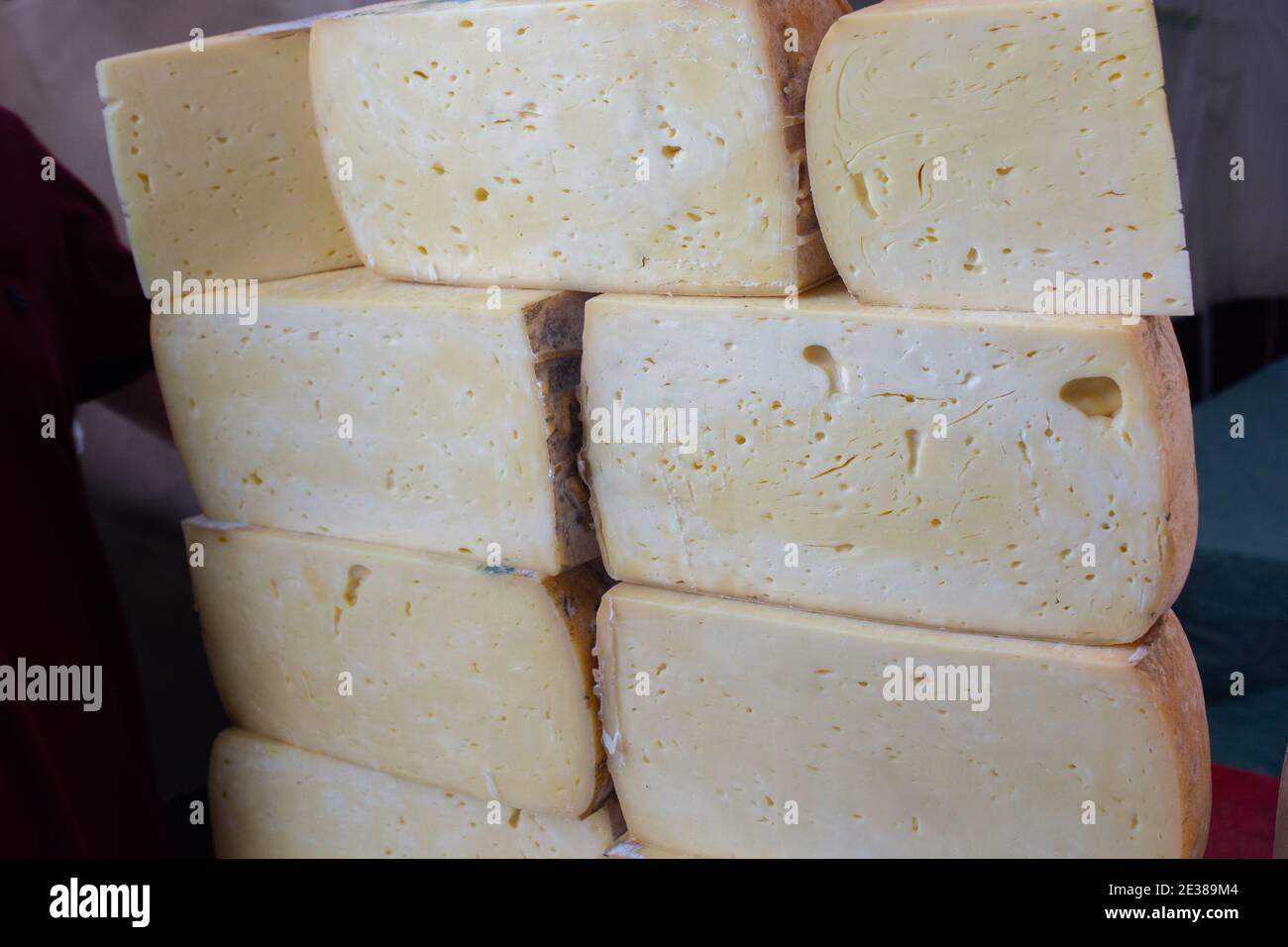 cuts of kashkaval or kasseri cheese for sale on the shelf Stock Photo ...