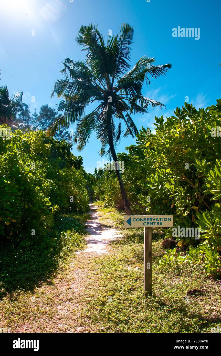 Footpath with directional sign post to the Conservation centre in a ...