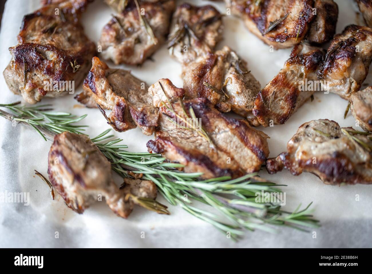 Serving meat on a parchment Stock Photo - Alamy